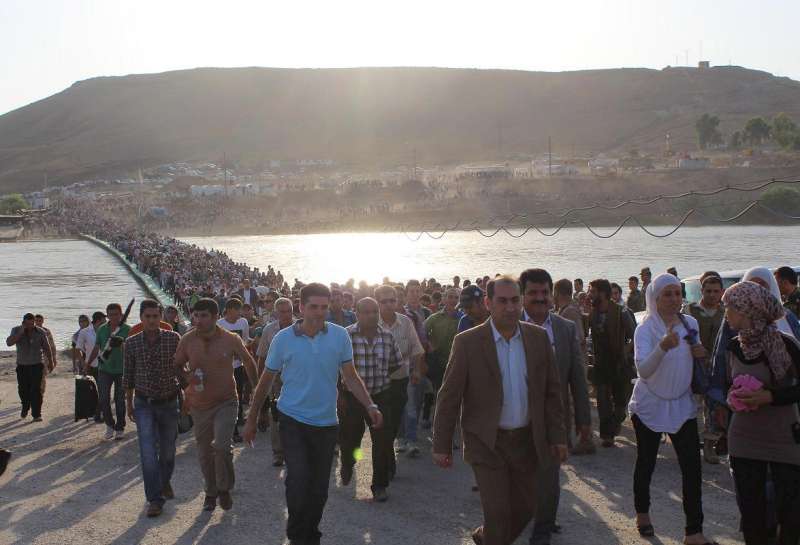 Mass influx of Syrian refugees into Iraq