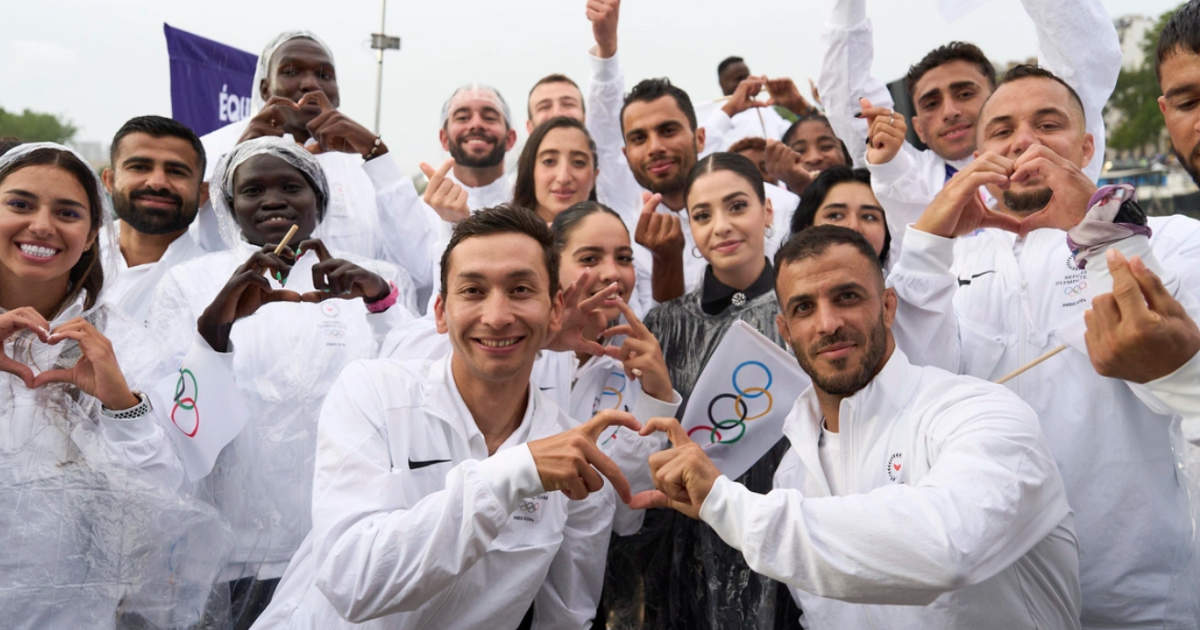 Largest-ever Refugee Olympic Team makes its entrance as Paris Games open